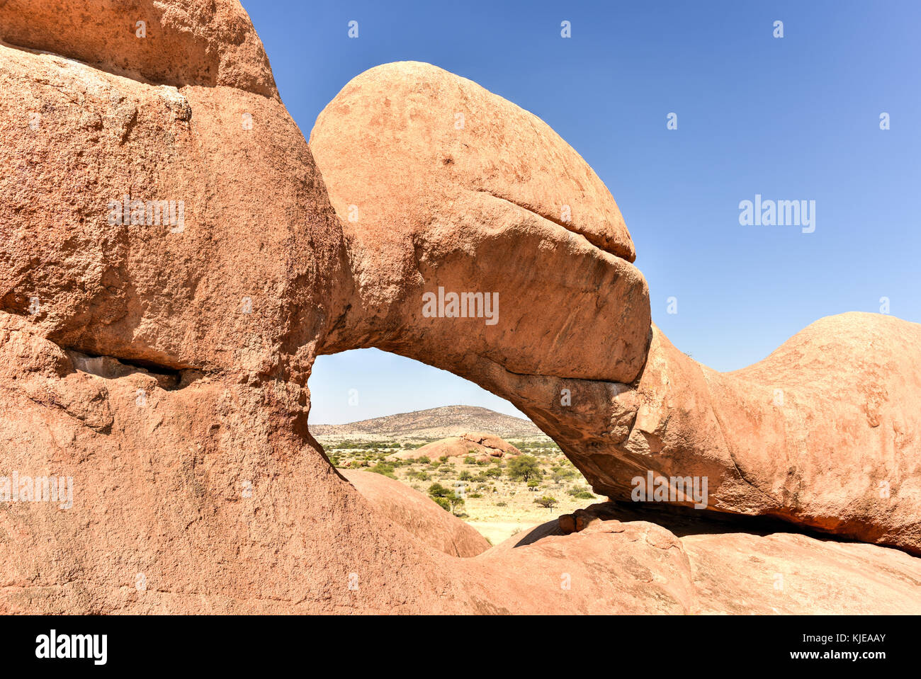 Landscape with massive granite arch in Spitzkoppe in the Namib desert ...