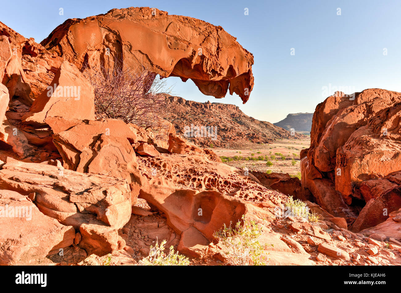 The lion's mouth rock formation throning on top of Huab valley in ...