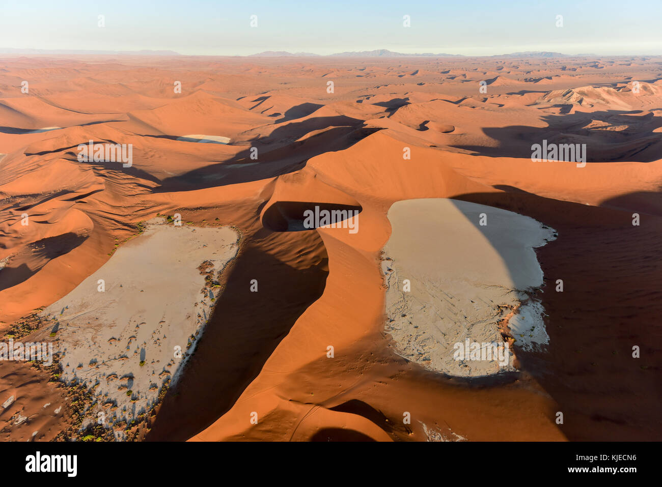 Aerial view of high red dunes, located in the Namib Desert, in the Namib-Naukluft National Park ...