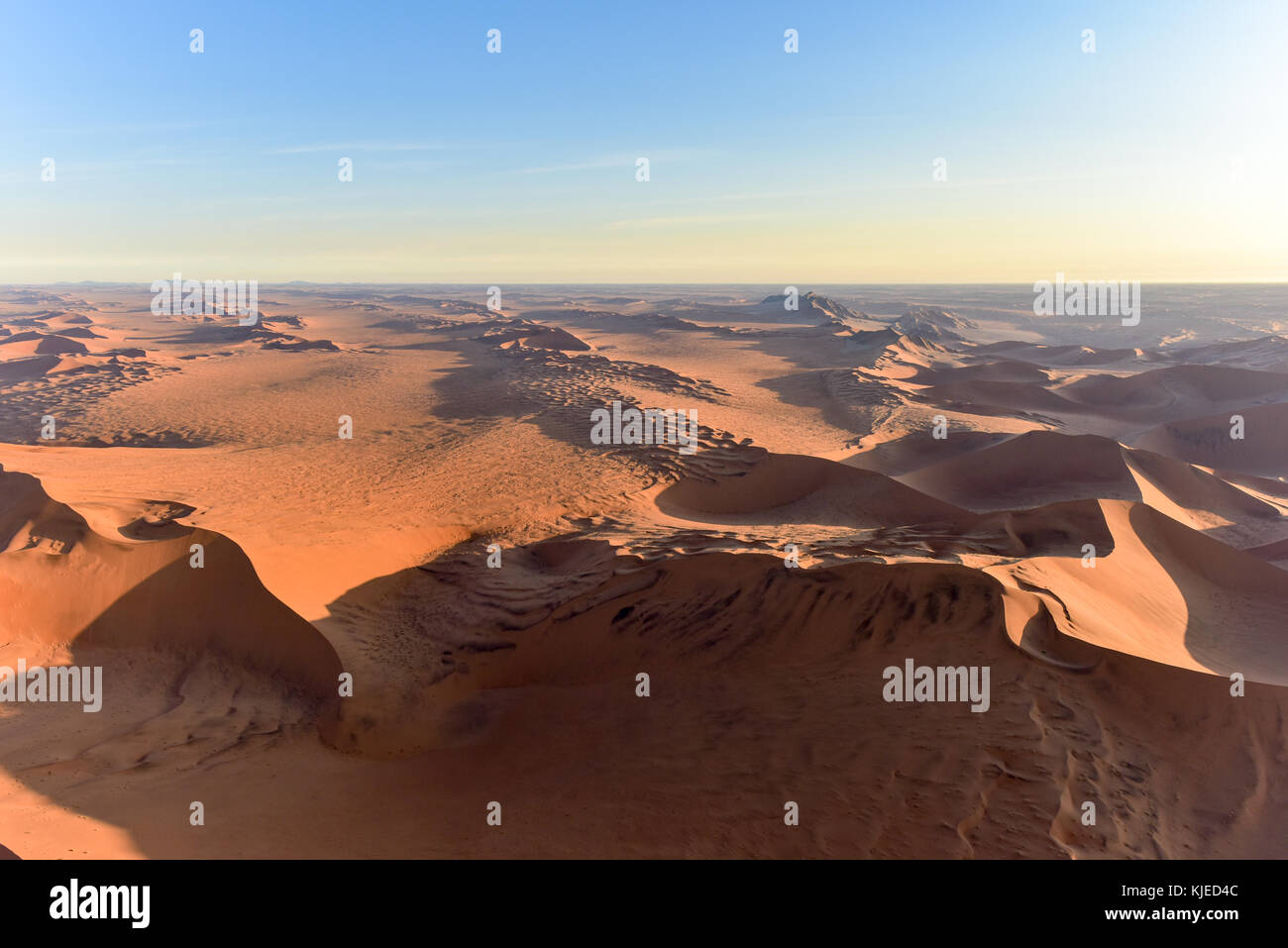 Aerial view of high red dunes, located in the Namib Desert, in the ...