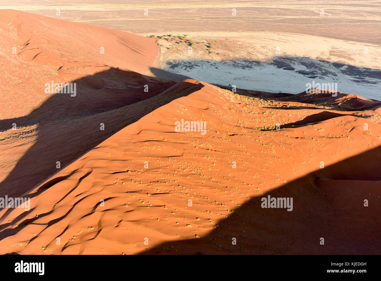 Aerial view of high red dunes, located in the Namib Desert, in the Namib-Naukluft National Park ...