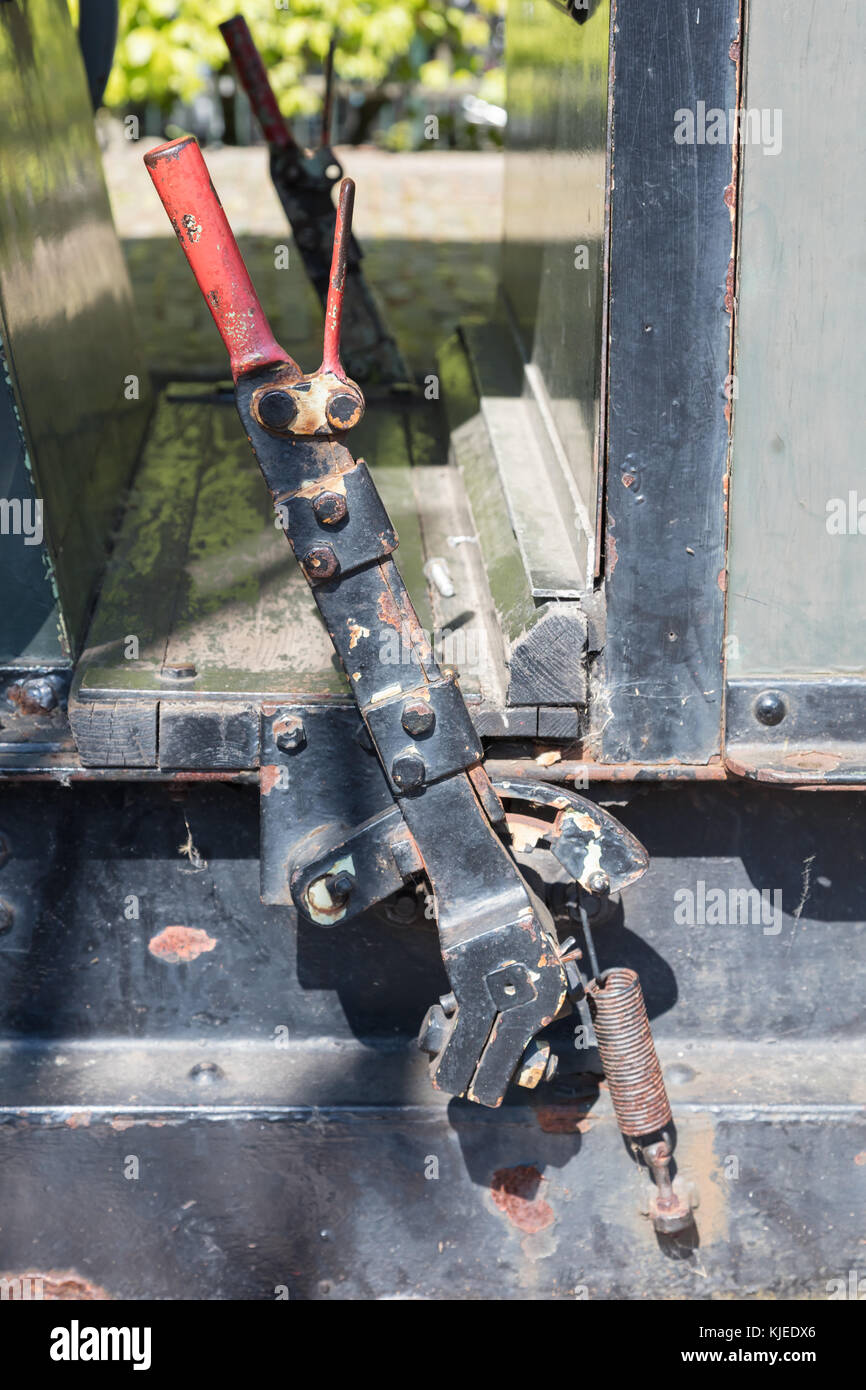 Old hand-operated lever in a train - Vintage technology Stock Photo - Alamy