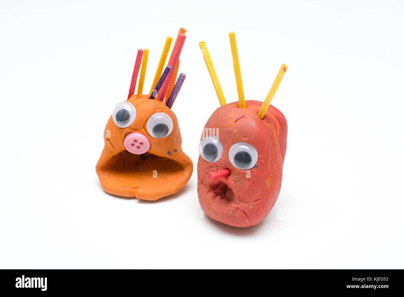 fun modelling clay figures with shocked expression on isolated white ...