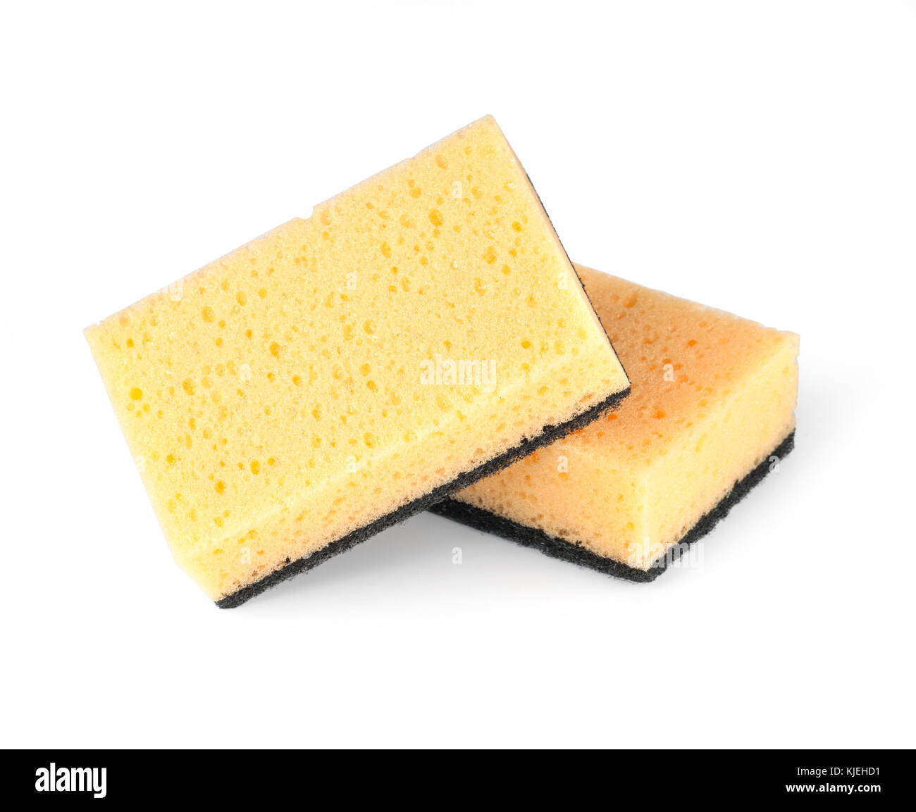Close up view of a yellow cleaning sponge isolated on a white ...