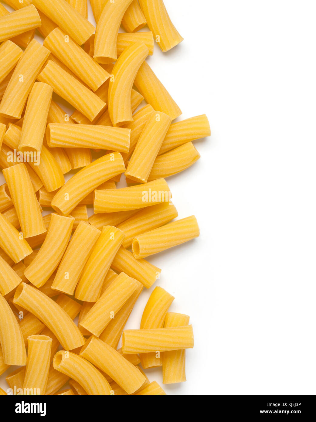 tortiglioni raw pasta isolated on white background with clipping path ...