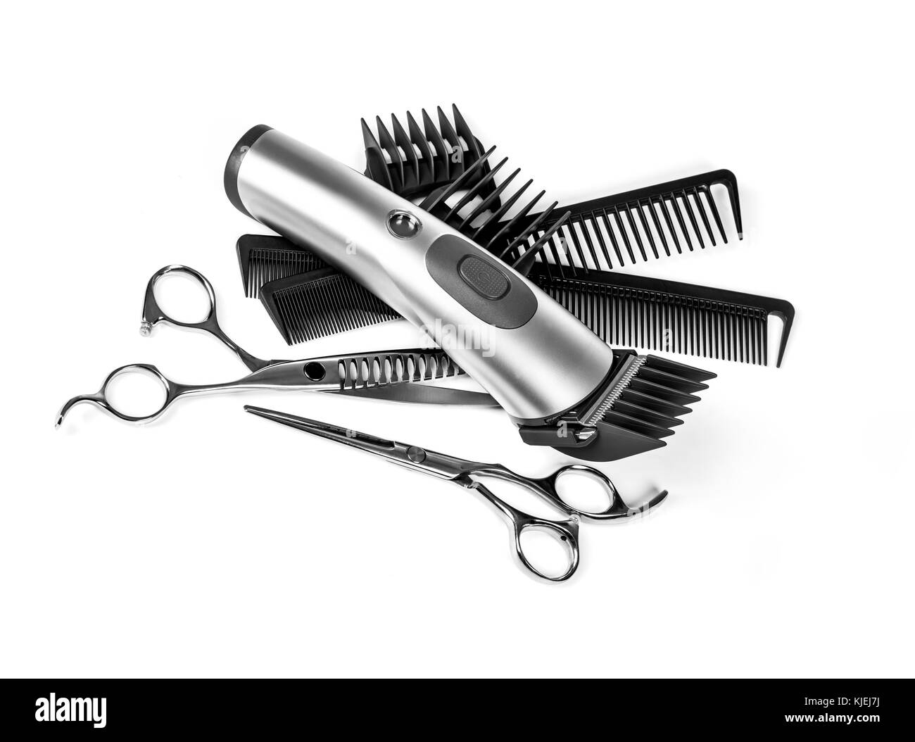 scissors and combs isolated on white background Stock Photo - Alamy