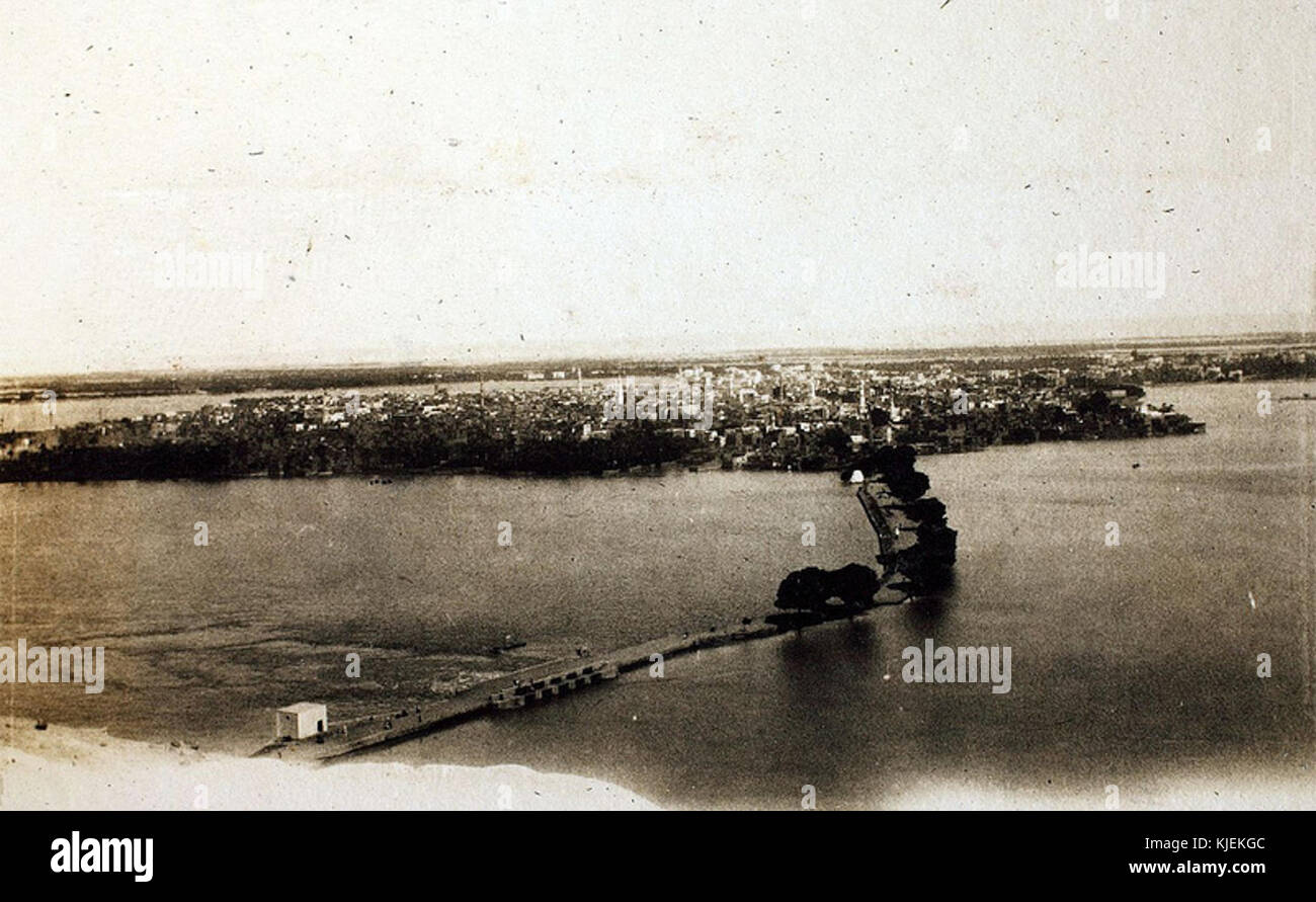 This image captures the main road near the Nile River during a flood ...