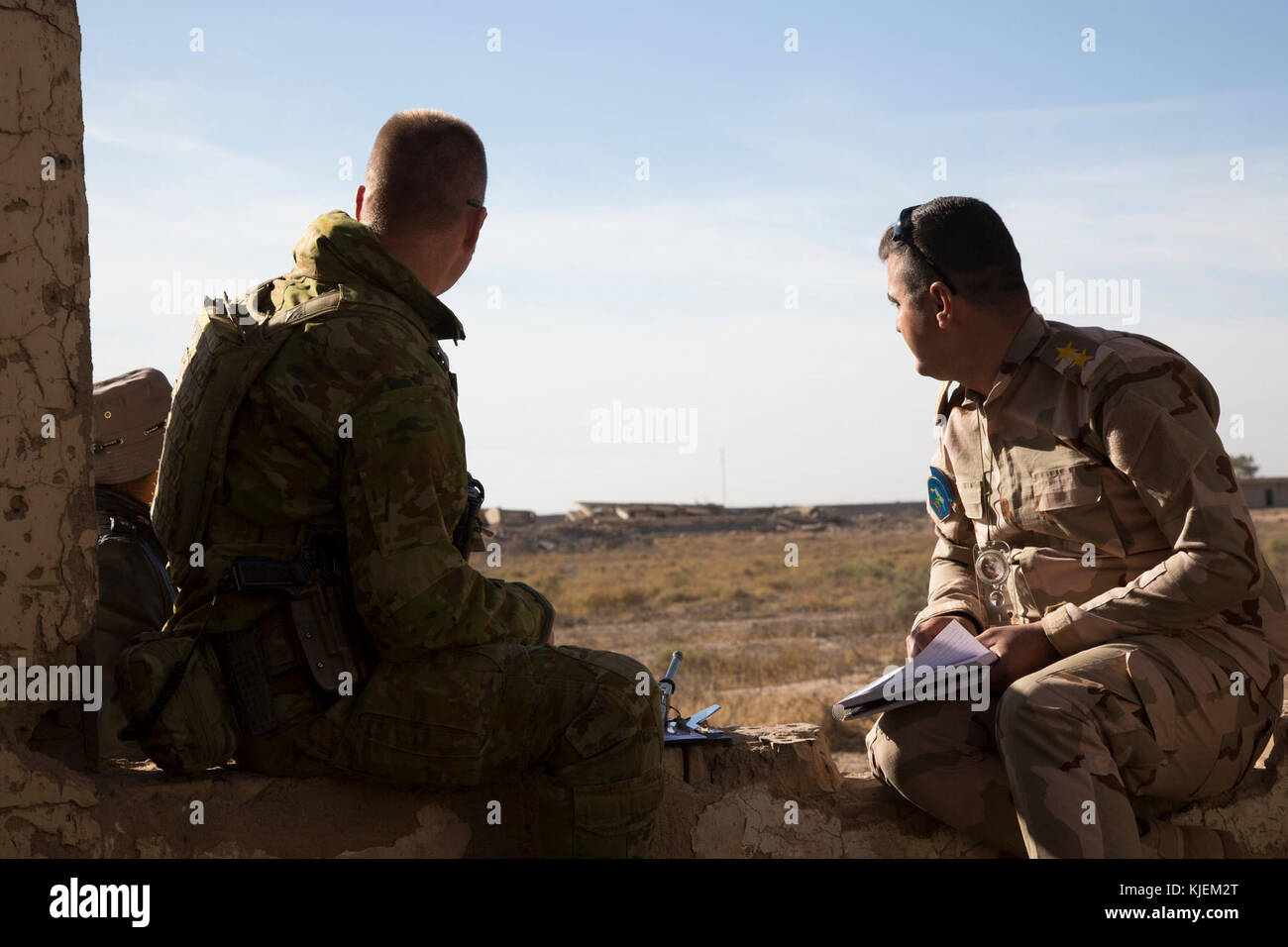 Australian trainer Sgt. Dave Devlin, (Left), assigned to the 4th ...