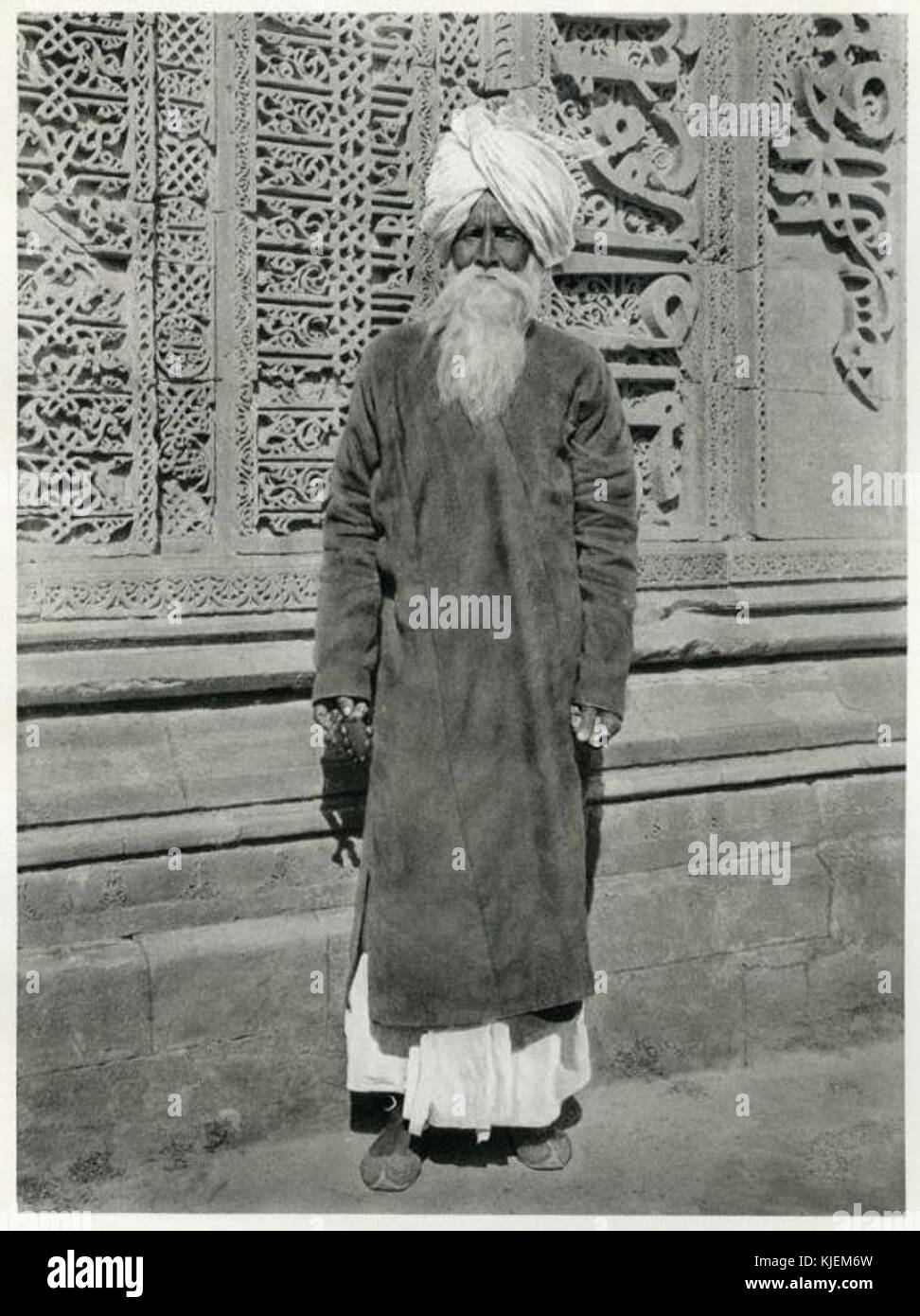 Portrait of a fakir in front of the Adhai din ka jhonpra Mosque at ...