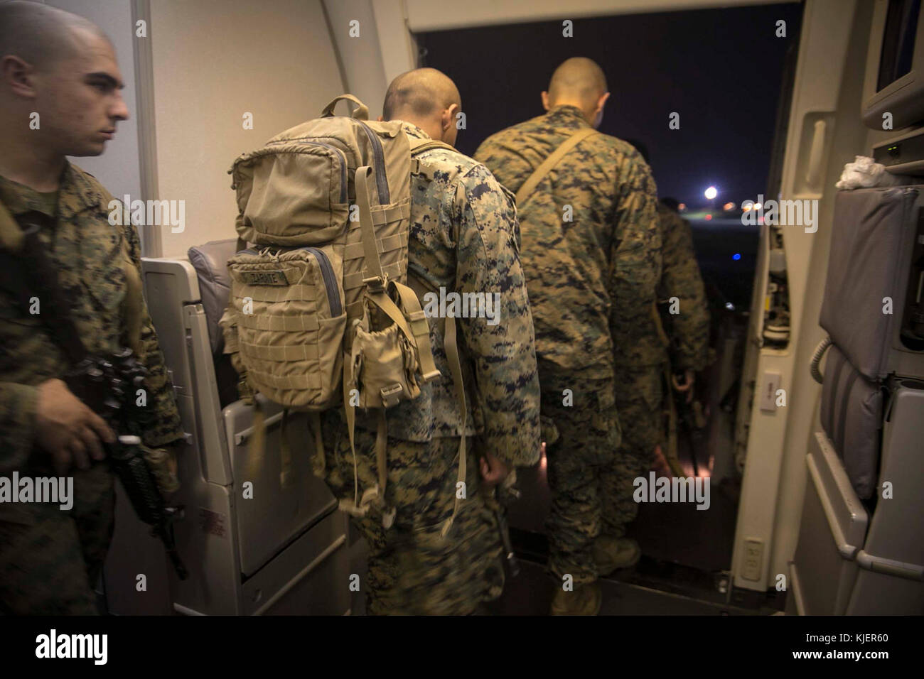 Marines with Battalion Landing Team, 1st Battalion, 1st Marines, exit ...