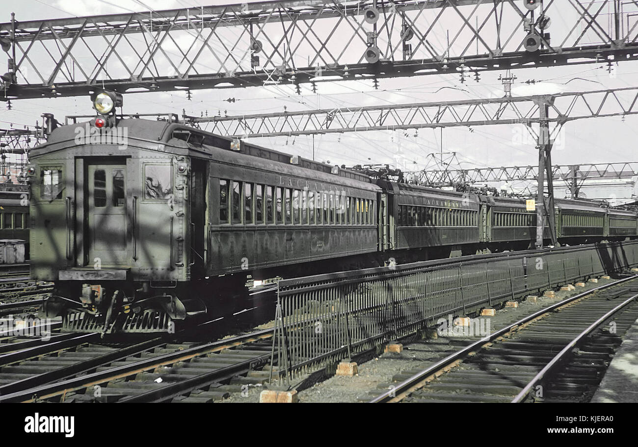 EL EMU electric suburban train leaving Hoboken, NJ passenger terminal ...