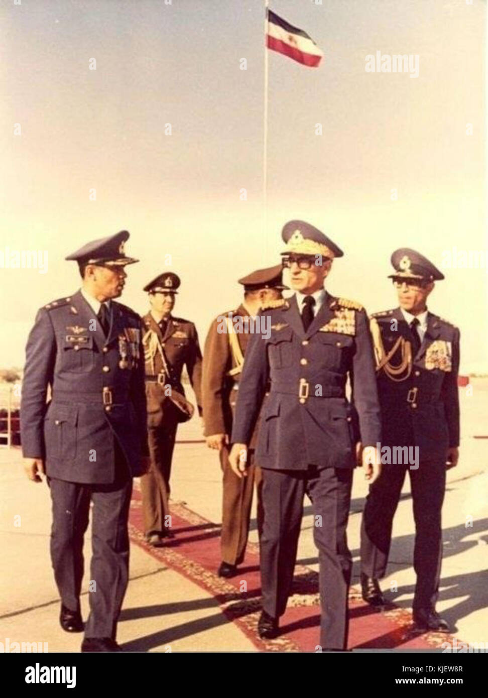 Mohammad Reza Pahlavi, the last Shah of Iran, is symbolized by the flag ...