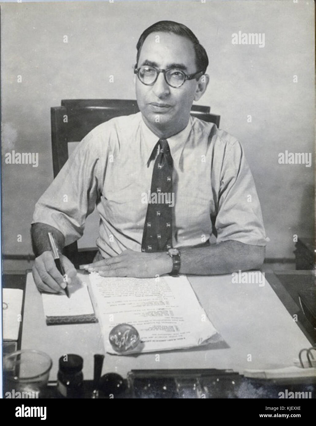This image features S. M. Ikram at his desk, reflecting his role in ...