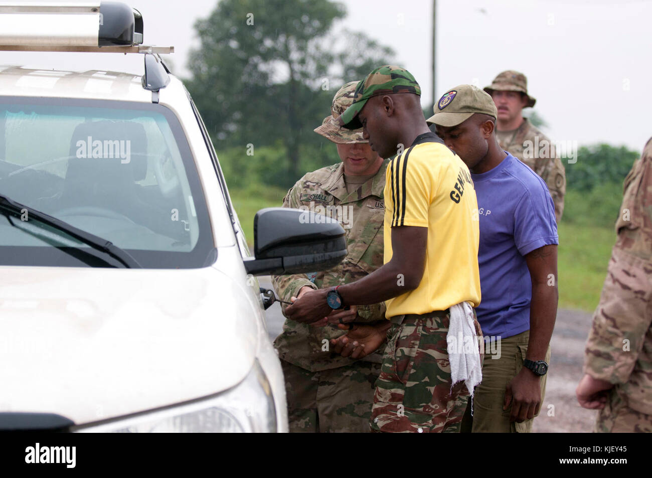 1st Lt. Jacob Schall, left, a platoon leader for the 764th Ordnance ...