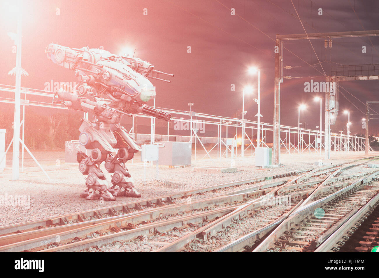Robot aiming guns at railroad tracks Stock Photo - Alamy