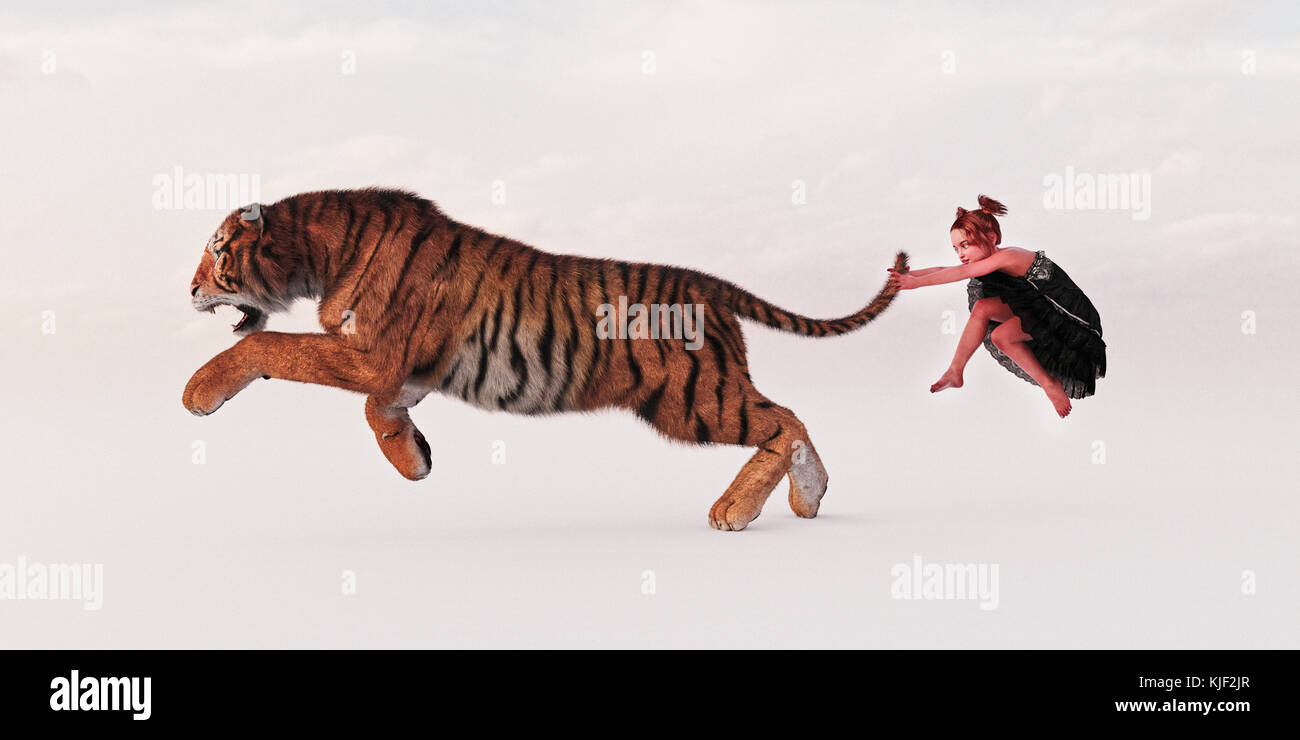 Girl holding tiger by the tail Stock Photo - Alamy