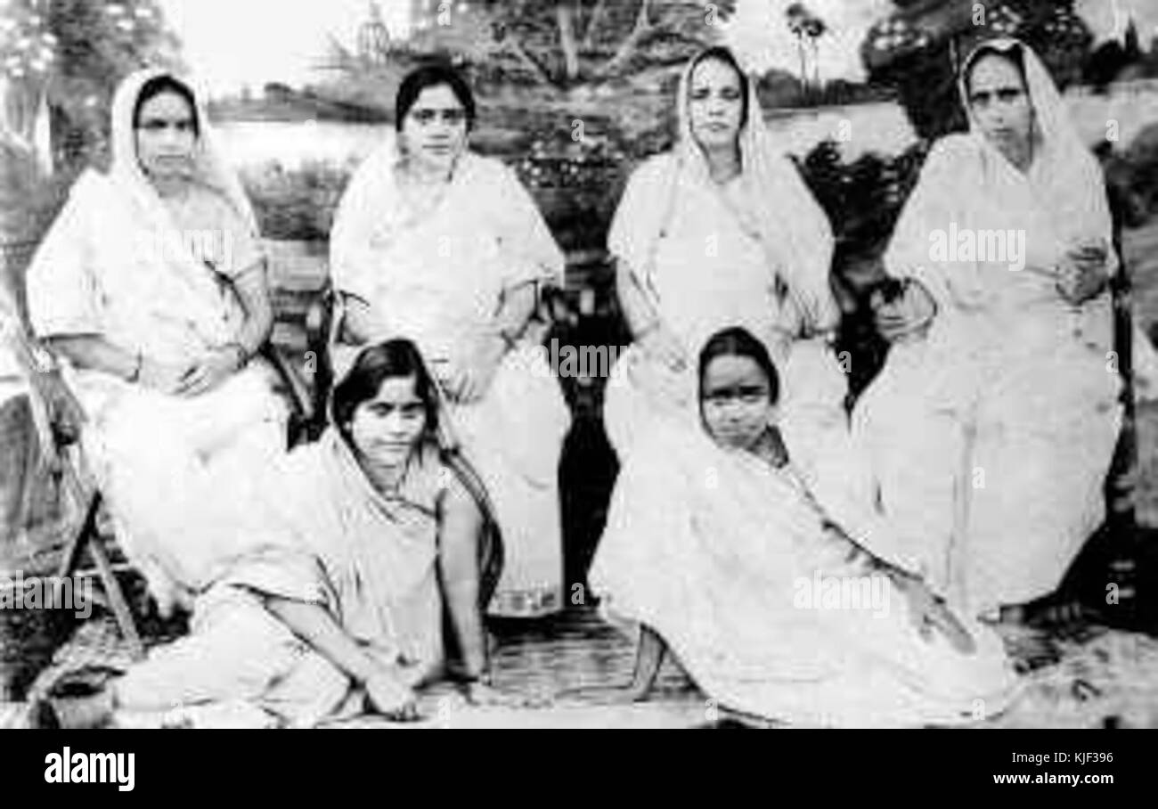 A photograph featuring Sarala Devi and a group of unidentified women ...