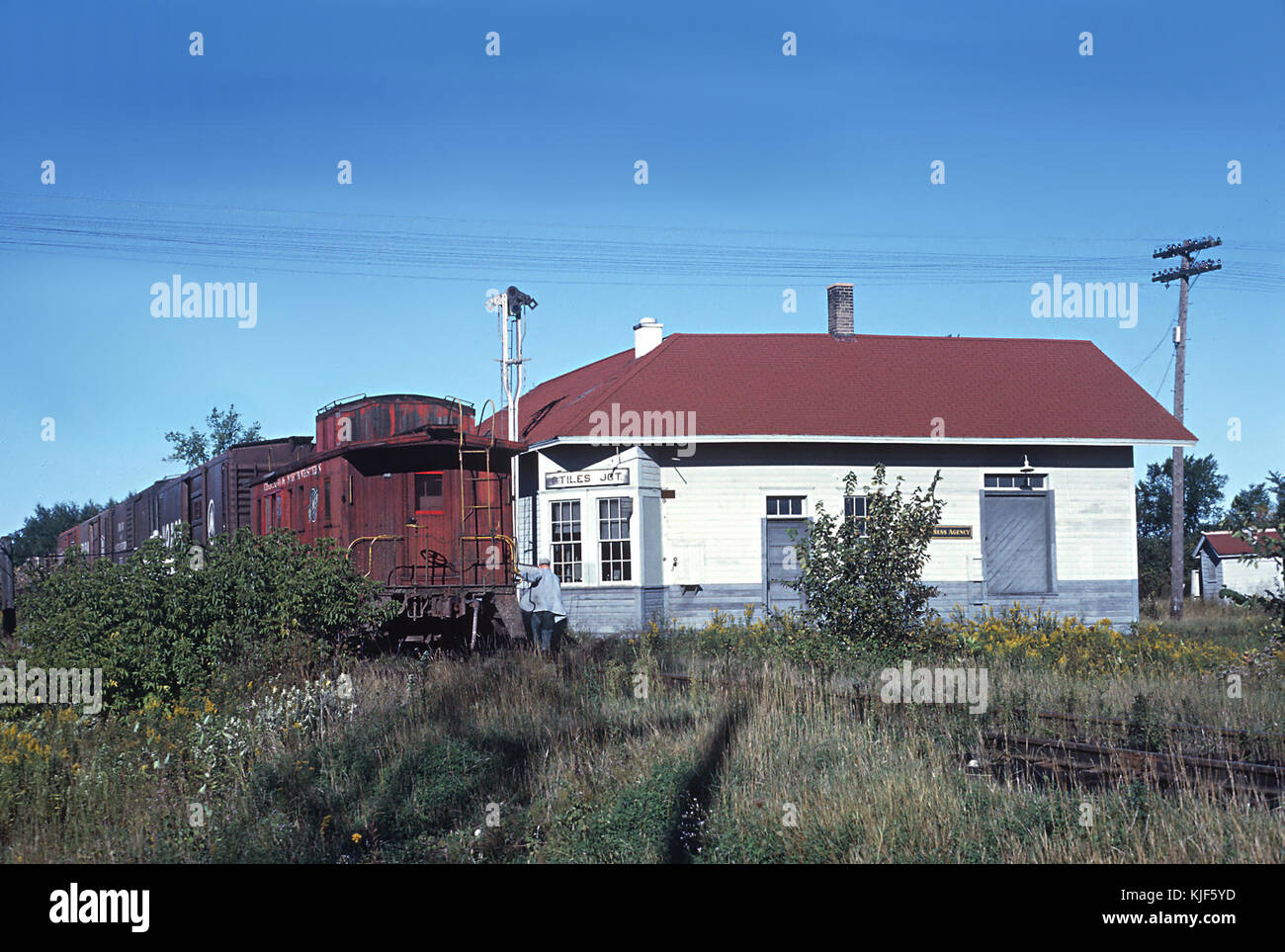 CNW wayfreight passing the MILW station at Stiles Jct., WI in September ...