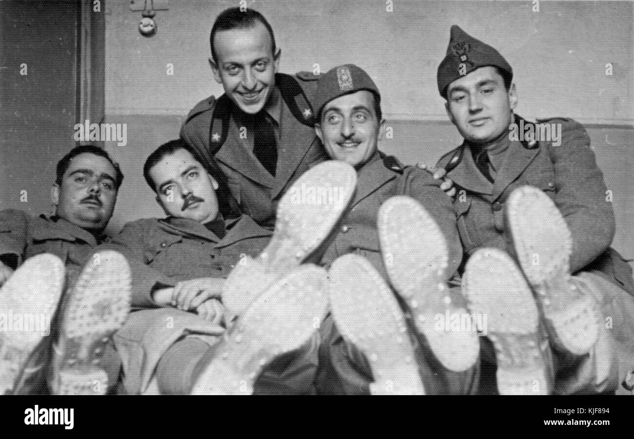 This photograph features Italian soldiers during World War II ...