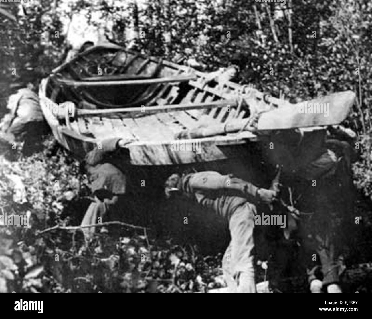 Portaging a York boat Stock Photo - Alamy