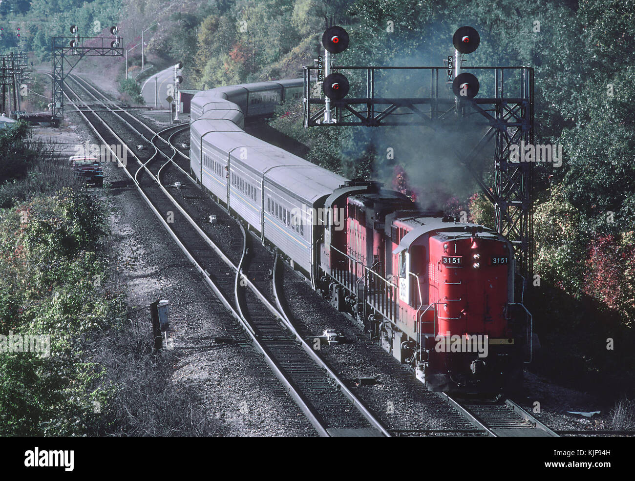 CN 3151 RS18m wih a train of Hawker Siddeley Tempo cars at Bayview Jct ...