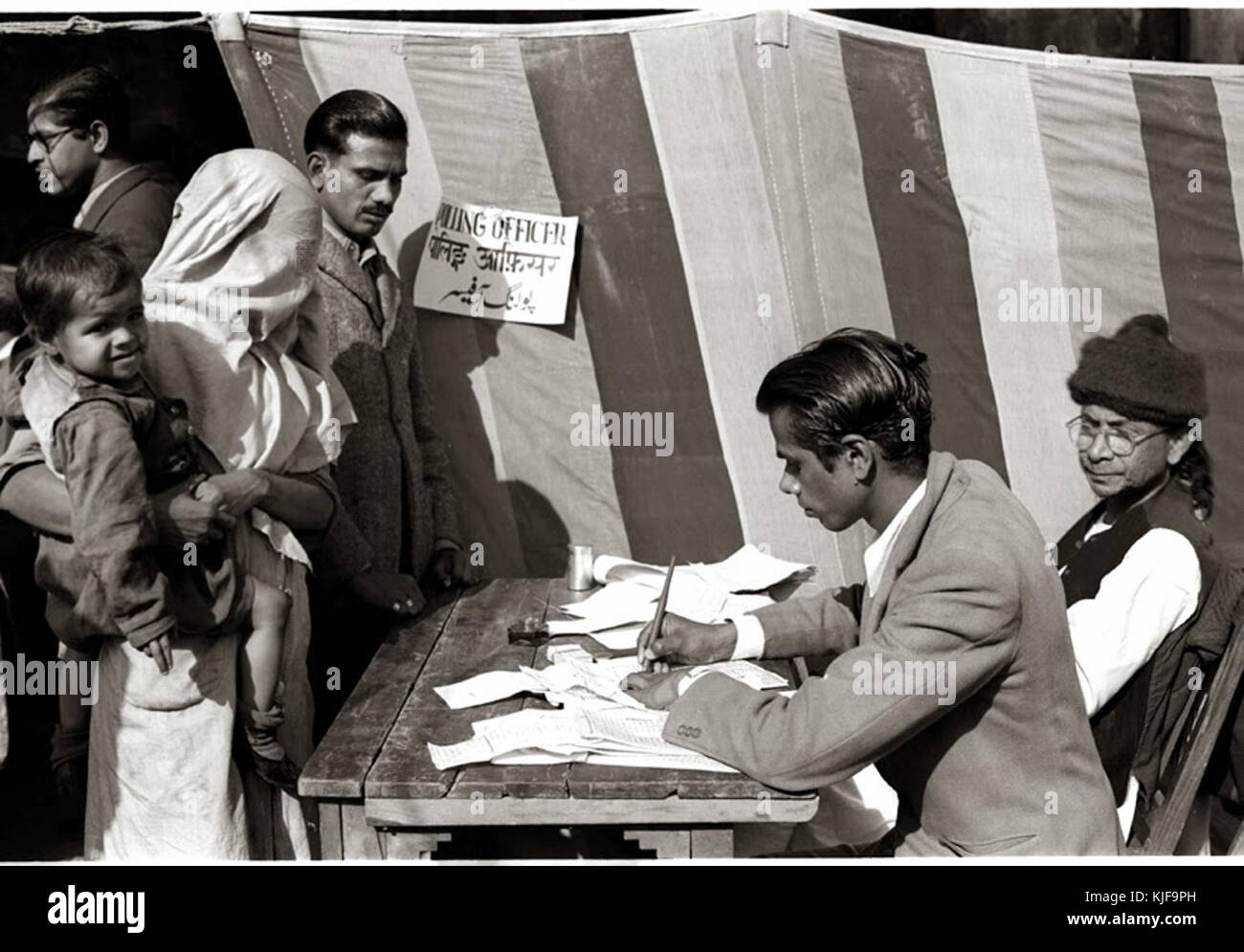 A Muslim lady preparing to cast her vote at a polling booth near Jama ...