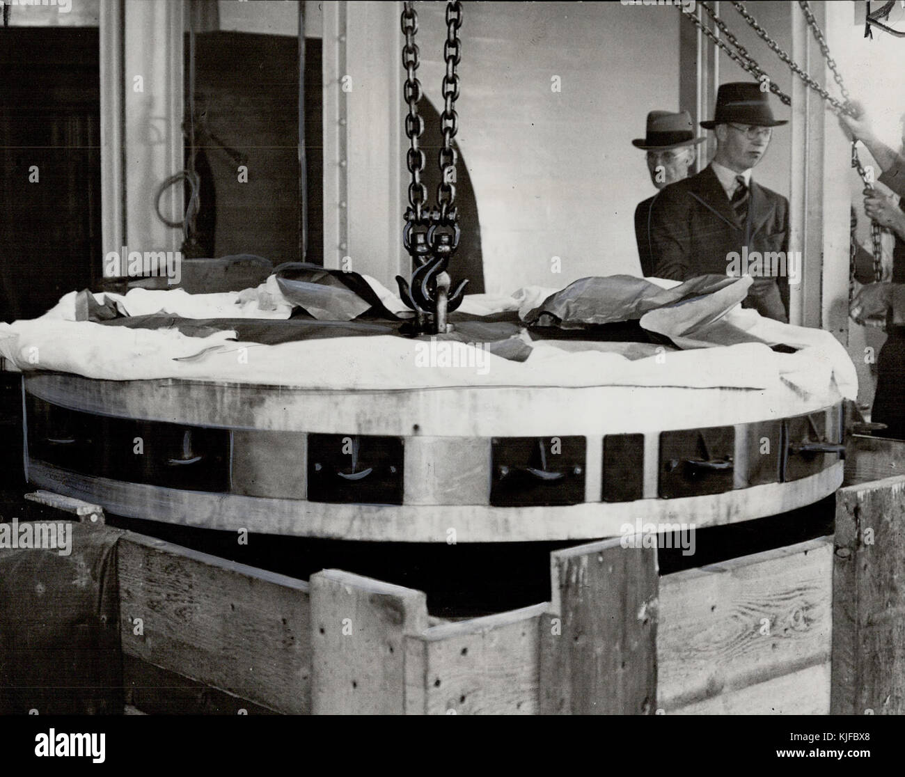 This image showcases the installation of a mirror at an observatory, a ...