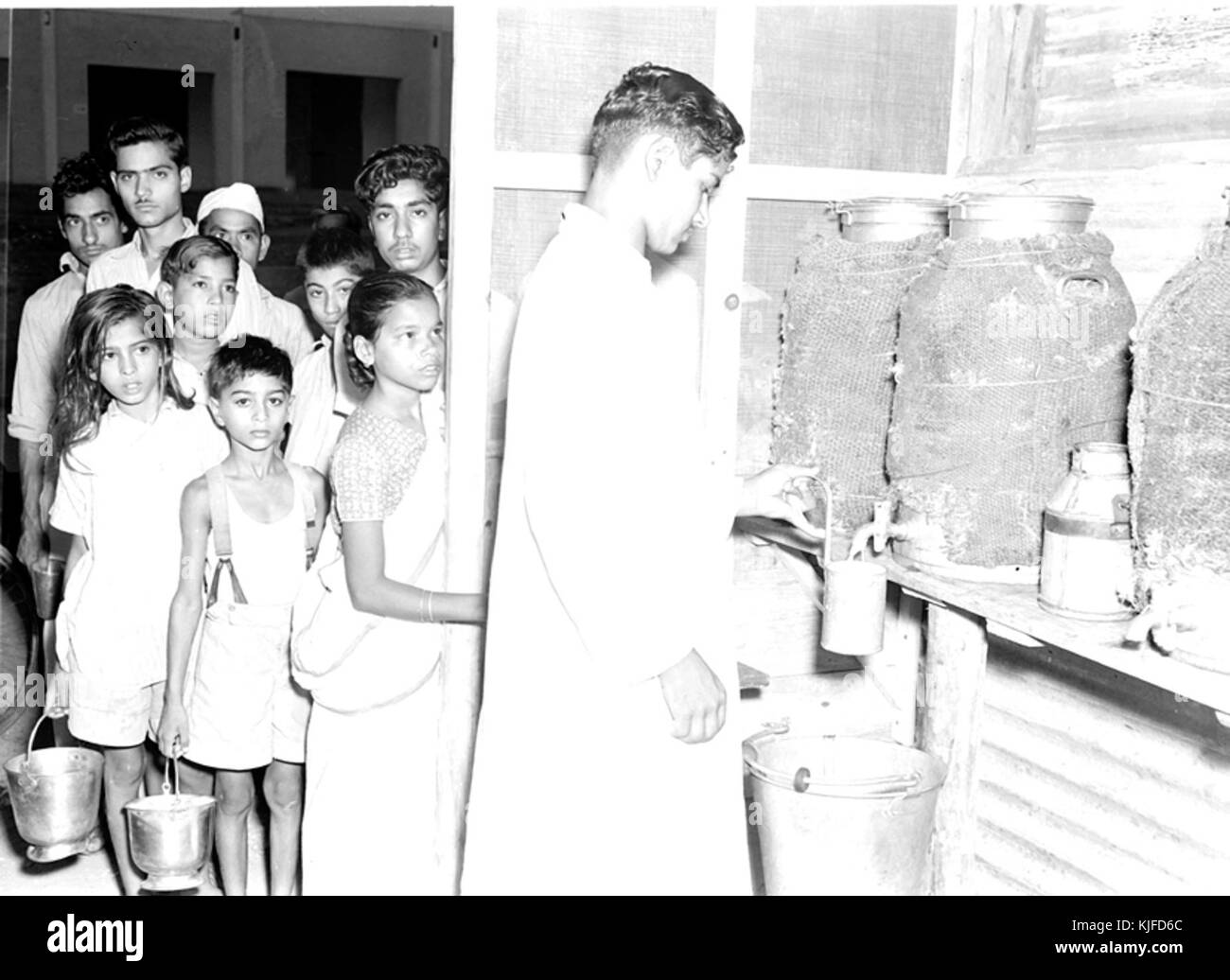 Delhi Milk Supply Scheme children at distribution centre 1951 Stock ...