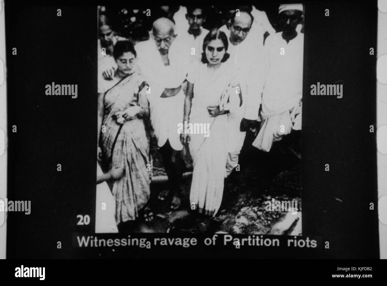 A photograph or account showing Mahatma Gandhi witnessing the ...