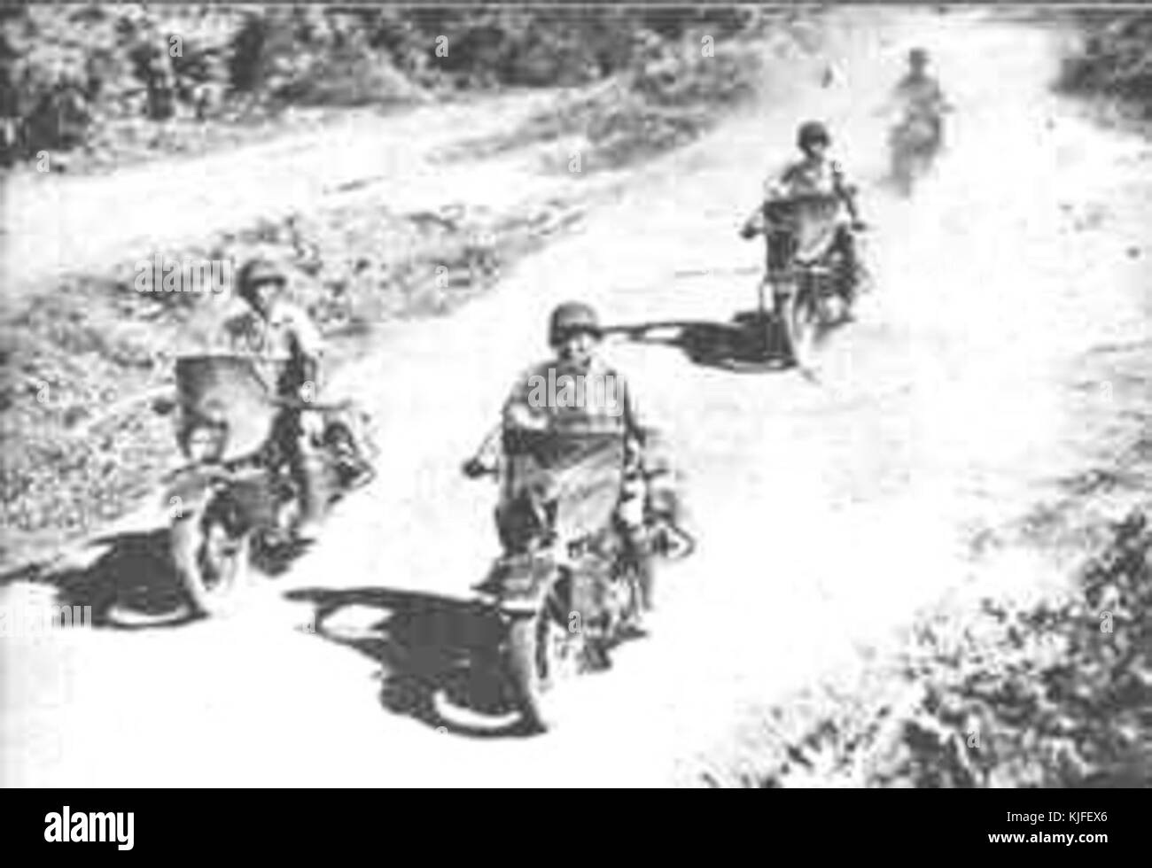 Chinese troops on motorcycles Stock Photo - Alamy