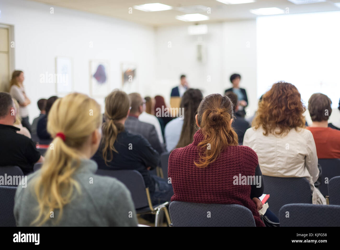 Speaker giving presentation on business conference Stock Photo - Alamy