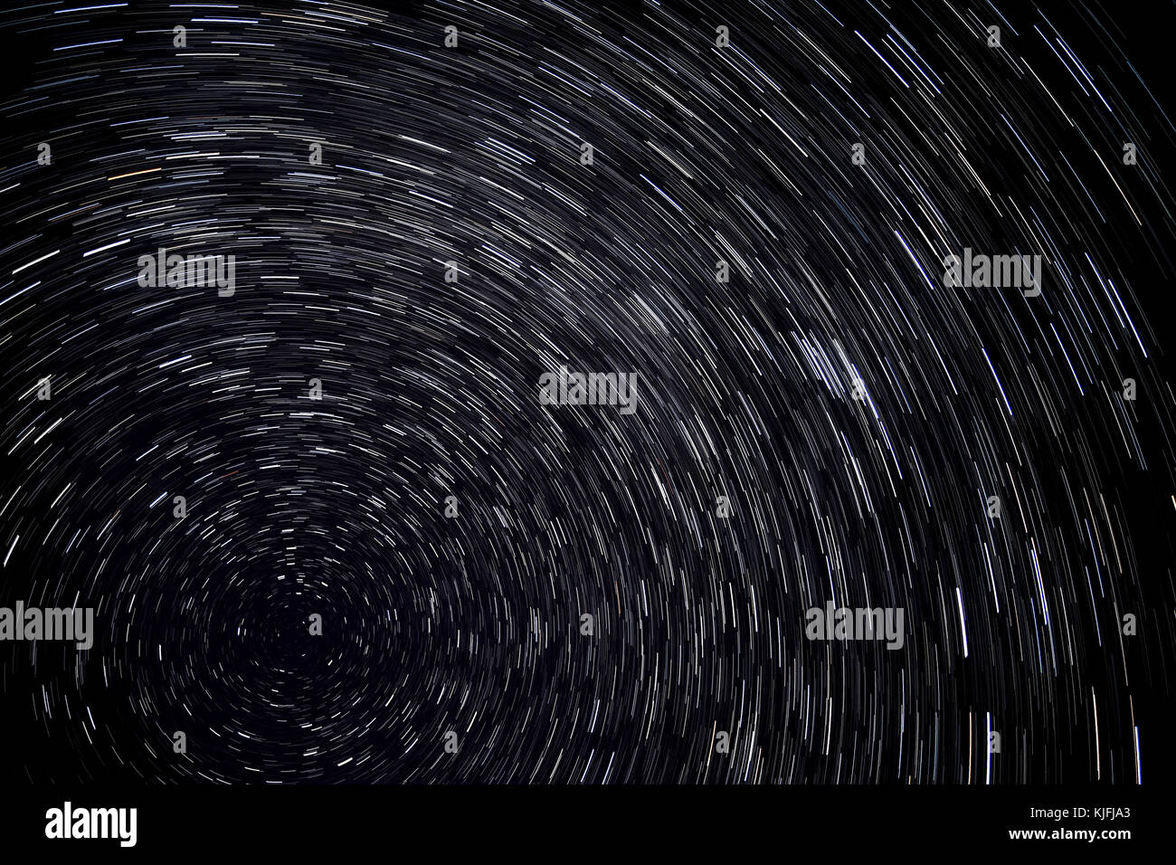 Abstract decorative background with swirls traces of stars revolving ...