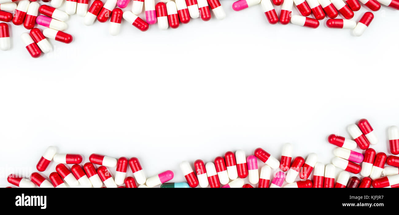 Colorful of antibiotic capsules pills isolated on white background with ...