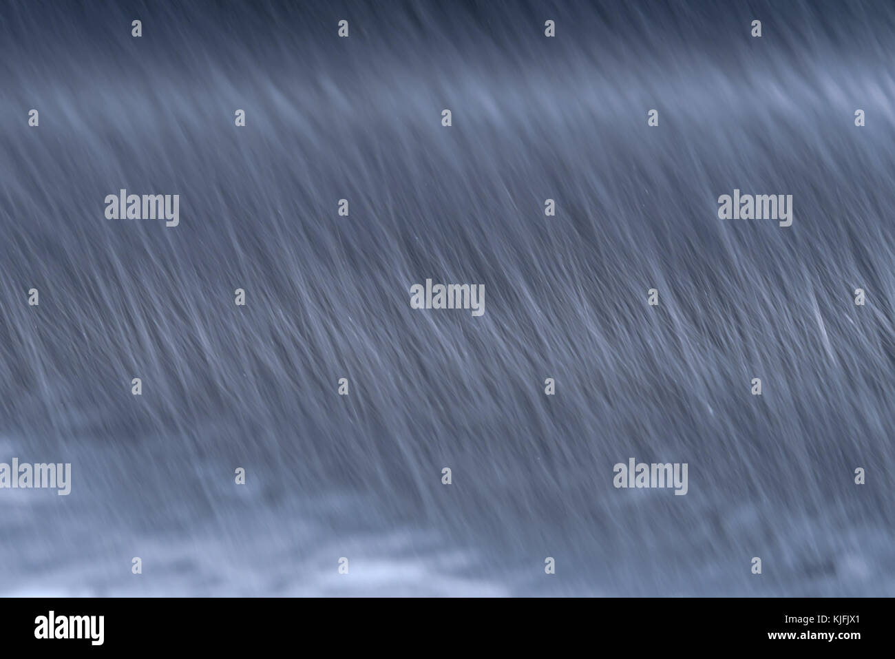 Winter abstract background of snowy tracks during a severe snowstorm in ...