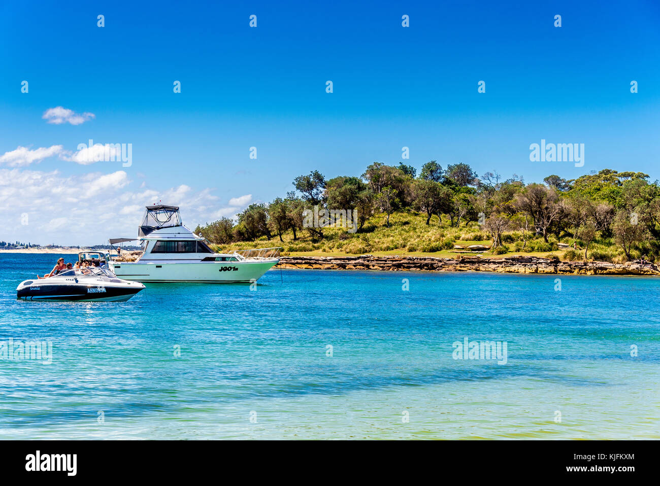 Boats moored at Jibbon Beach, Royal National Park, New South Wales ...