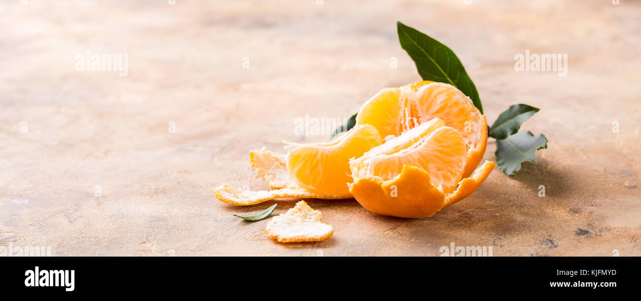 Fresh peeled mandarin tangerine Stock Photo - Alamy