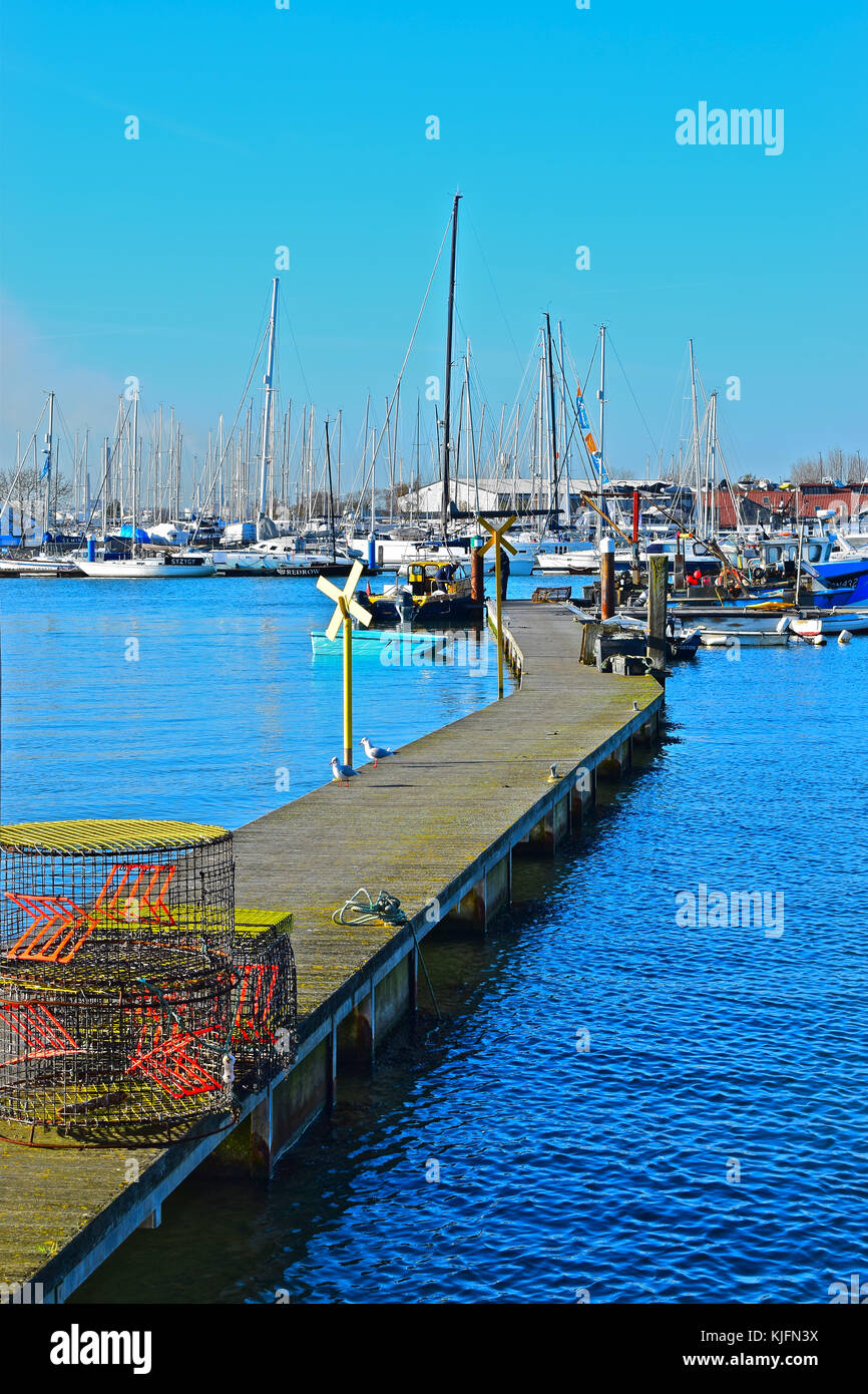 Lobster and crab pots on the fisherman's Jetty at Warsash on the river ...