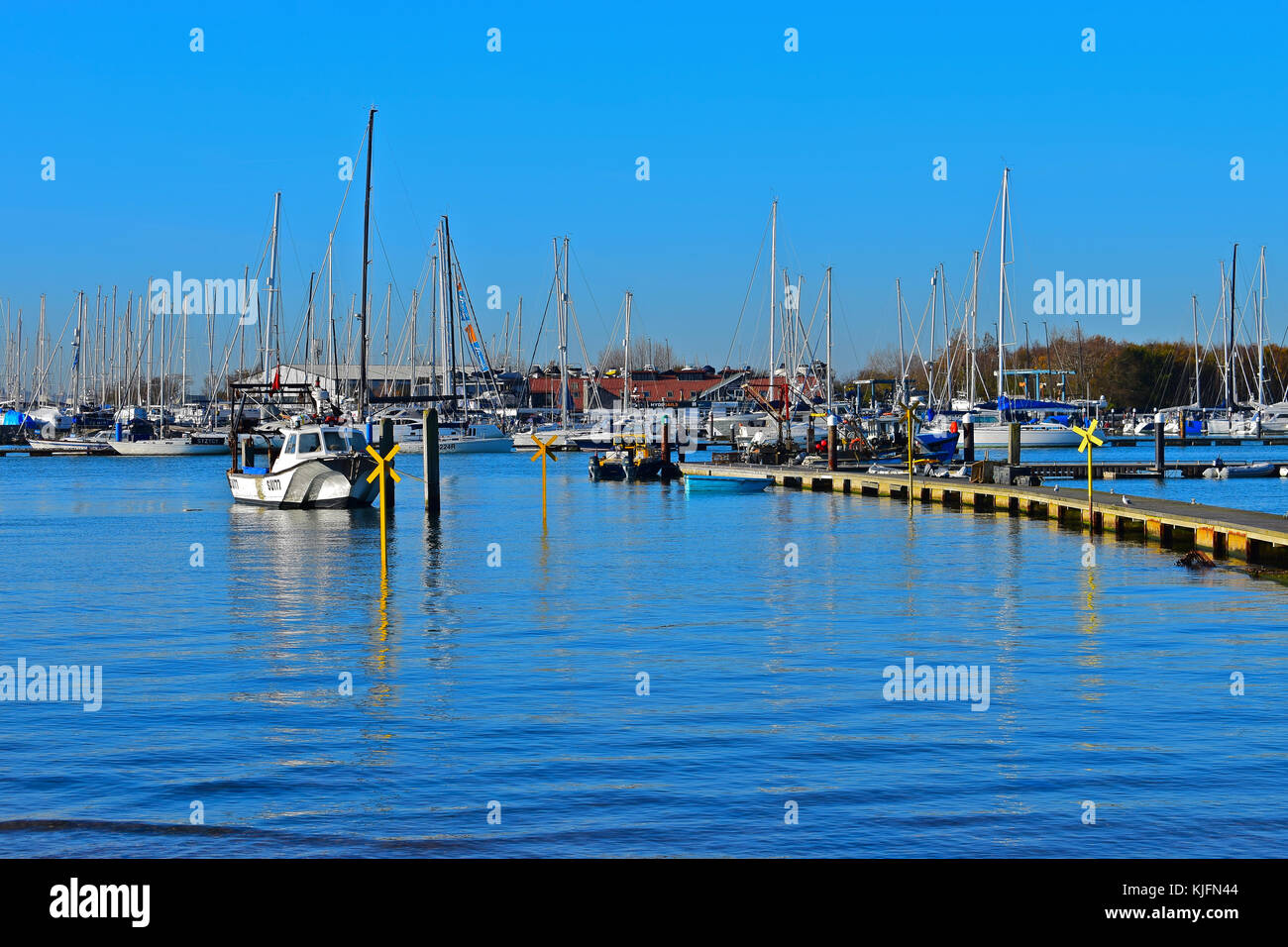 Blue skies and seas dominate this view across river Hamble towards ...