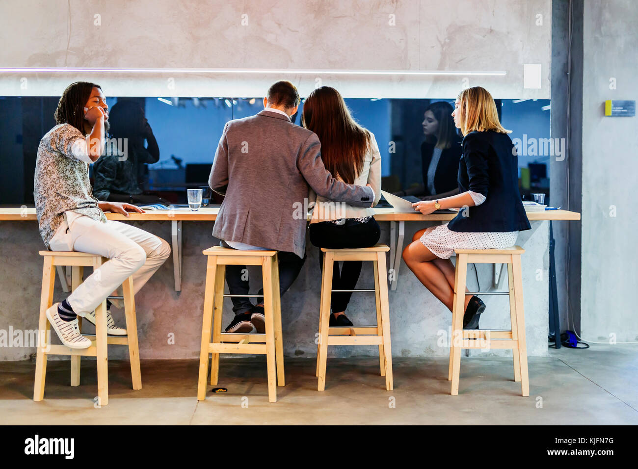 Group of business people having a break in the cafeteria Stock Photo ...