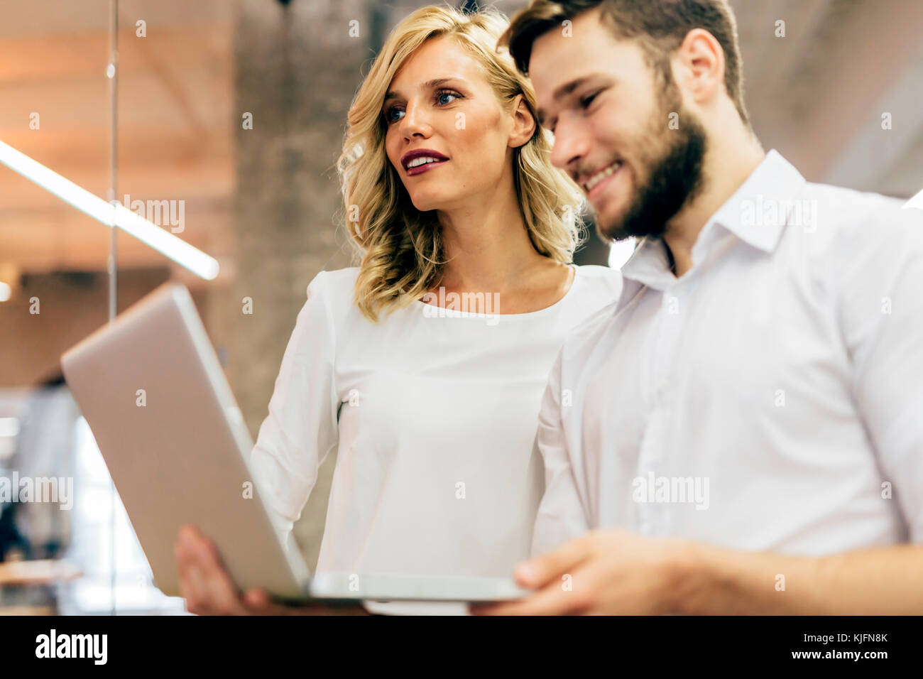 Colleagues brainstorming in the office Stock Photo - Alamy