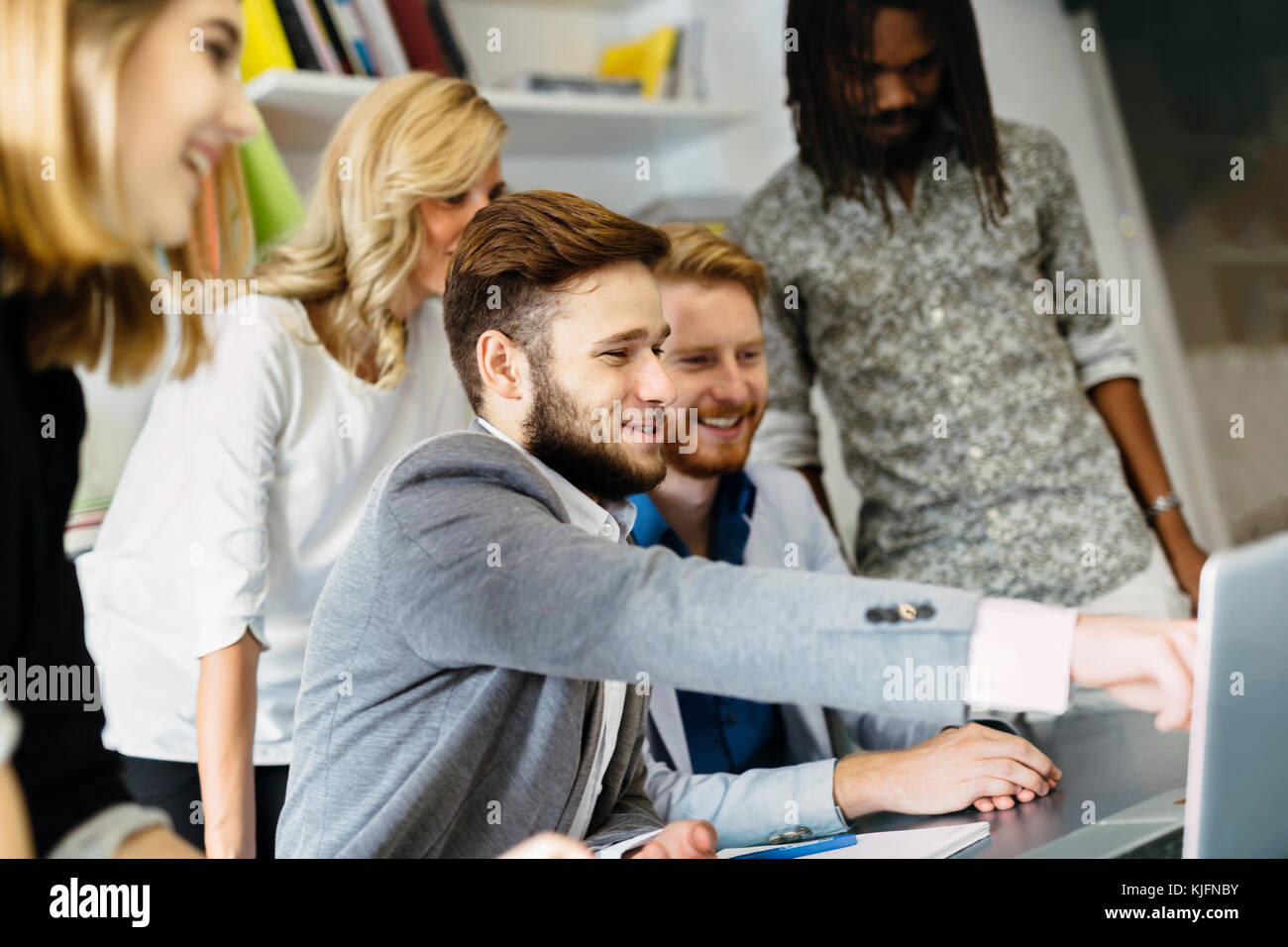 Colleagues brainstorming in office Stock Photo - Alamy