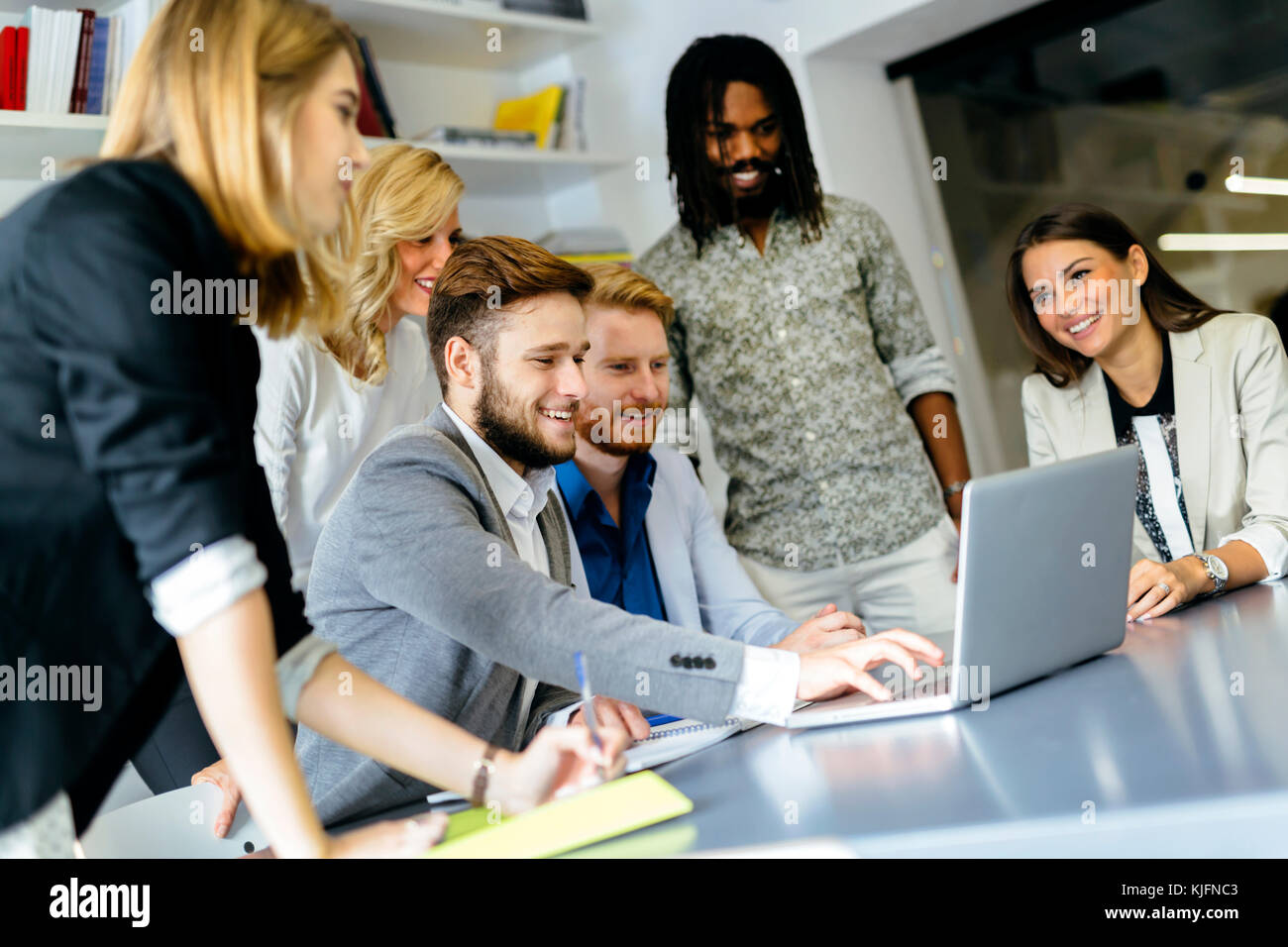 Colleagues brainstorming in office Stock Photo - Alamy