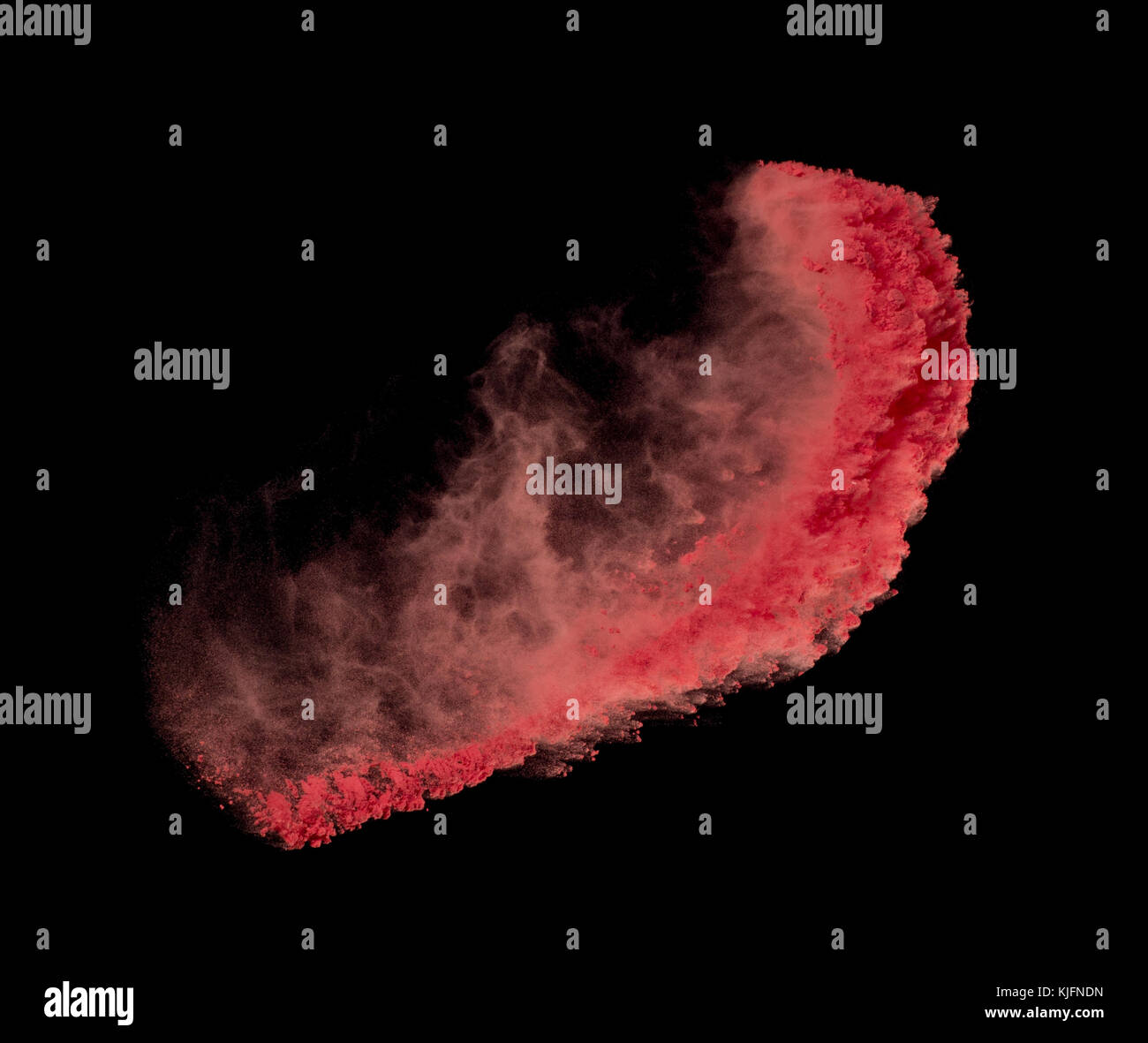 Explosion of red powder isolated on black background Stock Photo - Alamy