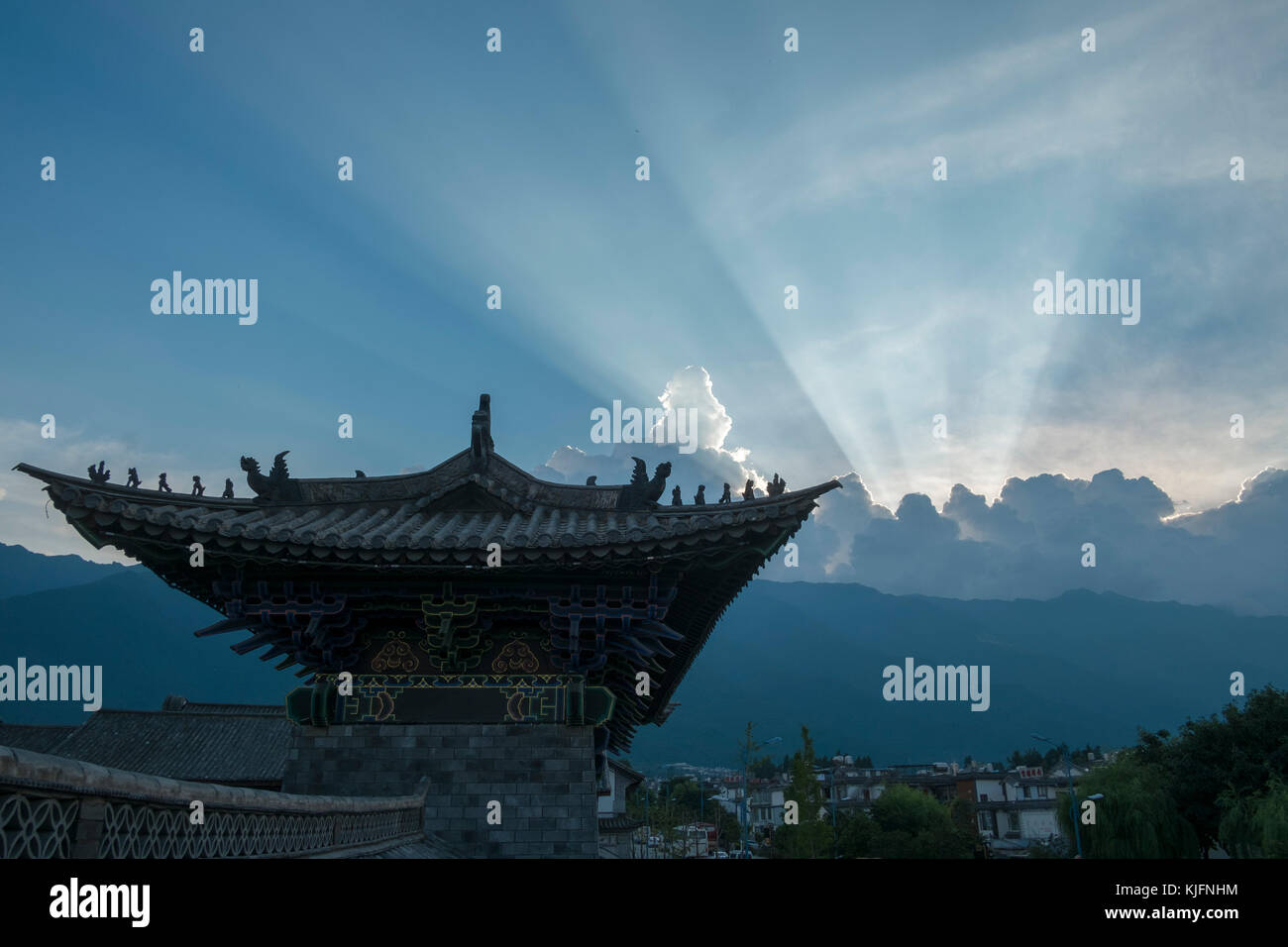 View of sun shining throughing the clouds in Dali, Yunnan province of ...