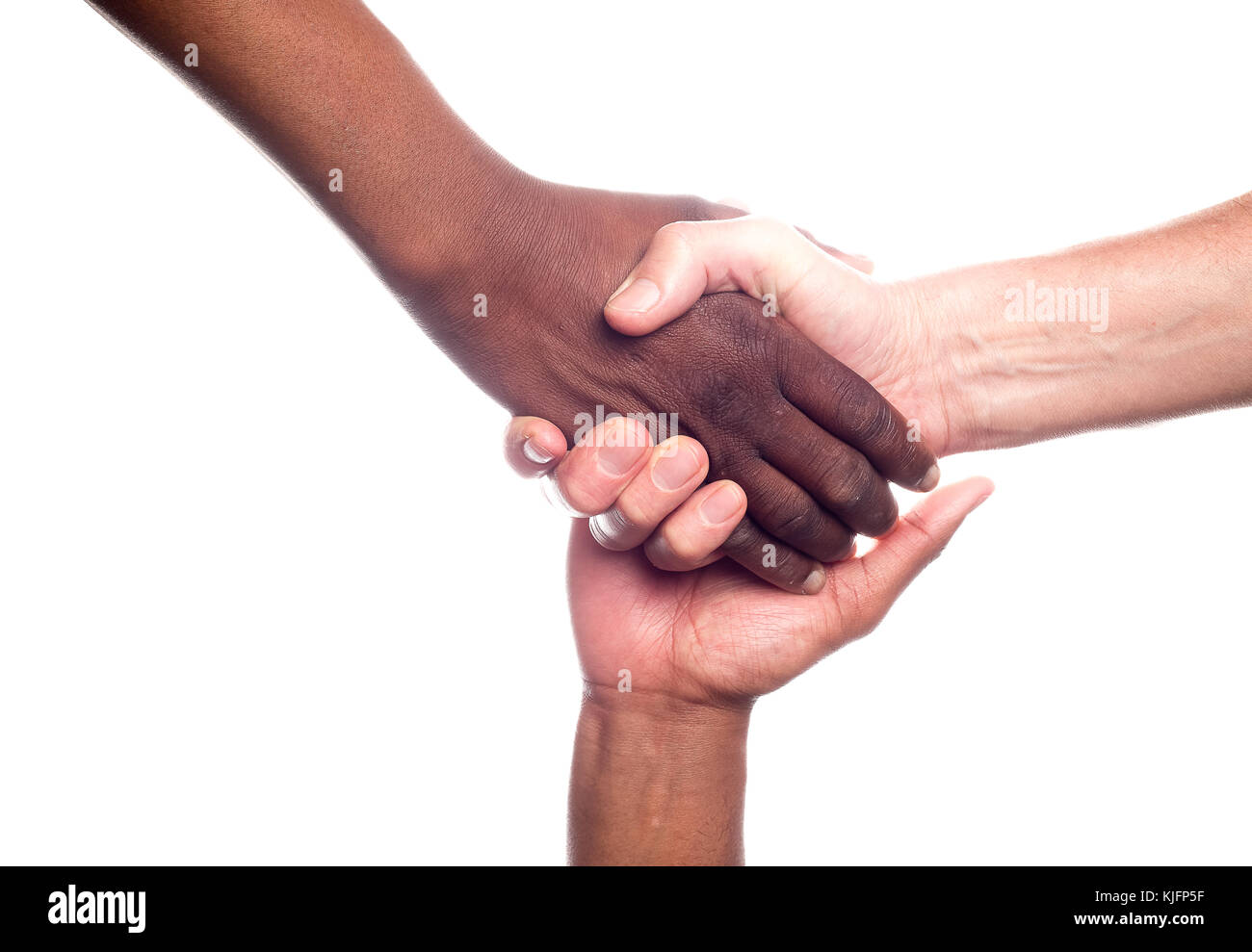 A close up view of a small group of men of mixed races holding hands in ...