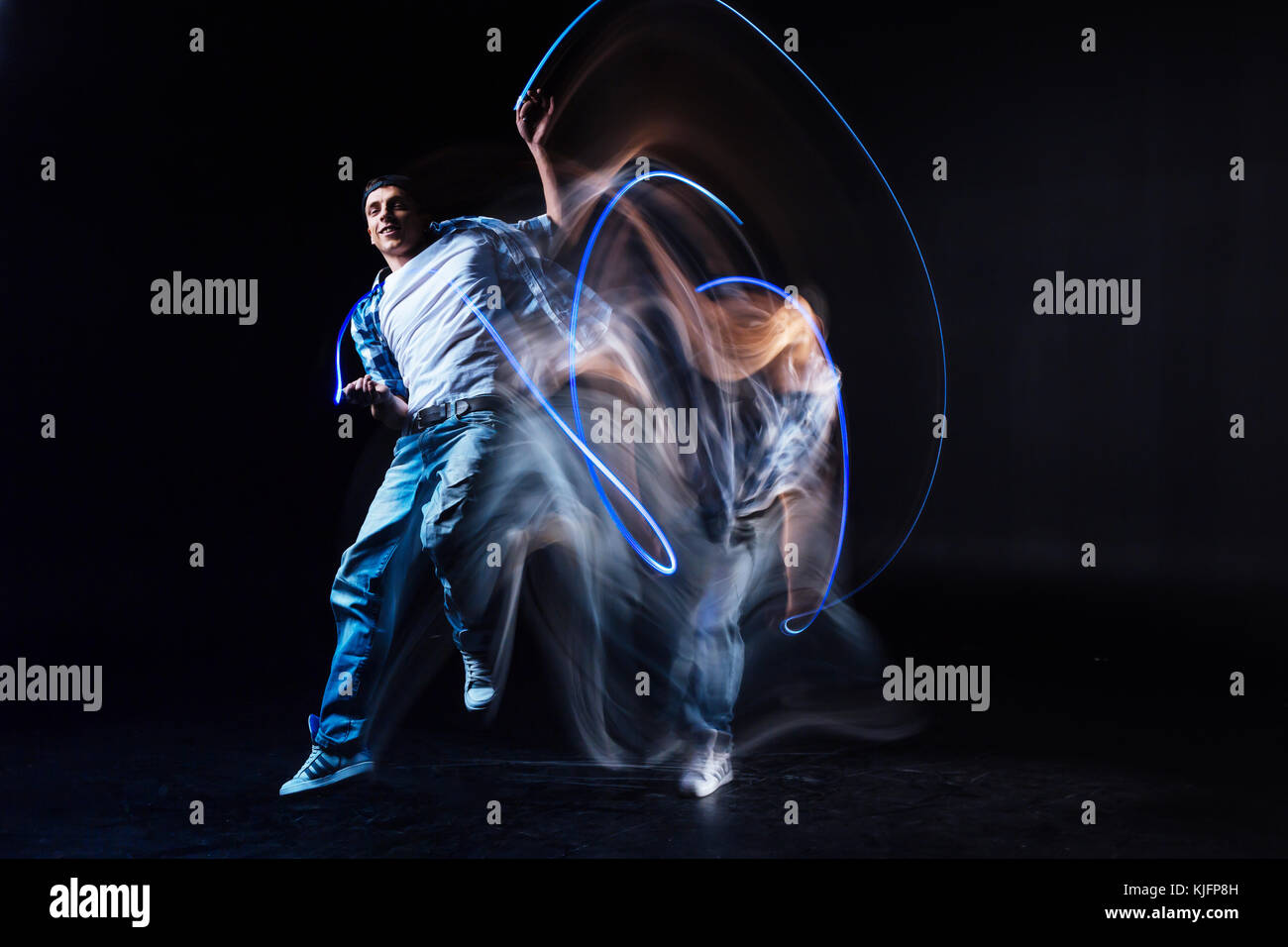 Happy well built man practicing his dance Stock Photo - Alamy