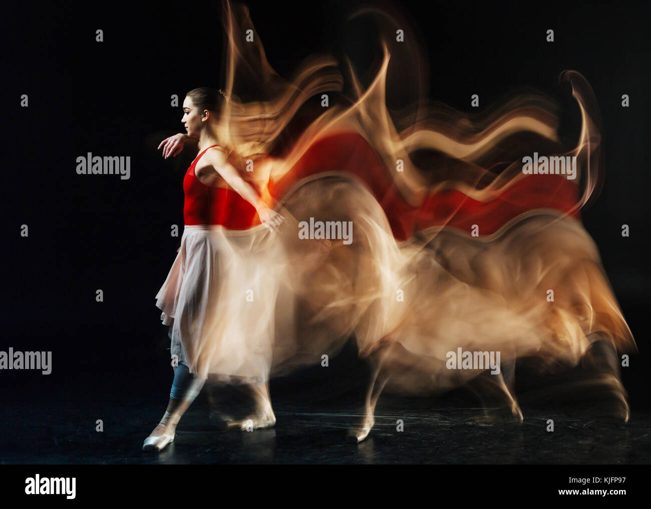 Beautiful young woman making a step Stock Photo - Alamy
