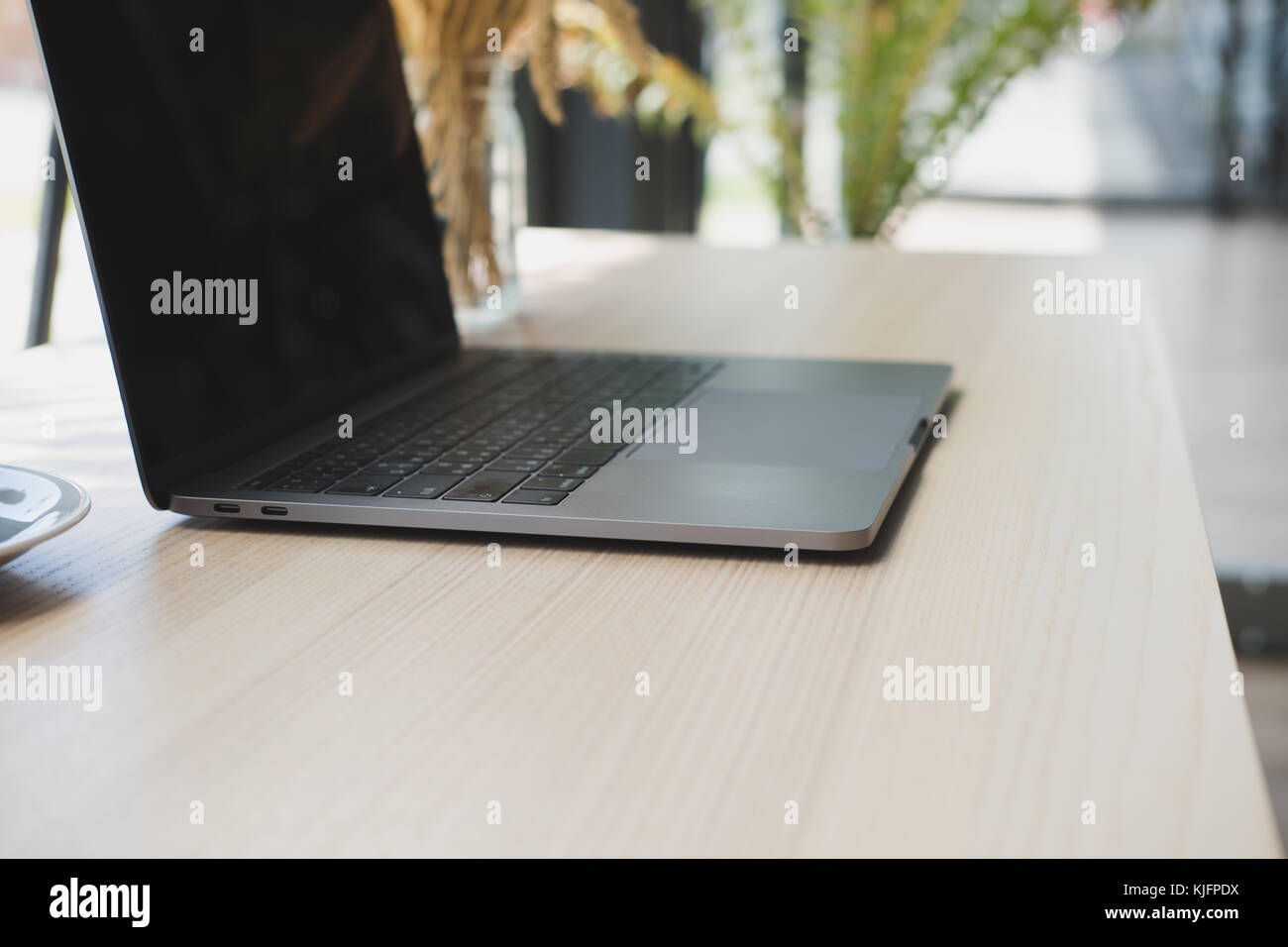 computer notebook on wood desk. laptop at office workplace Stock Photo ...