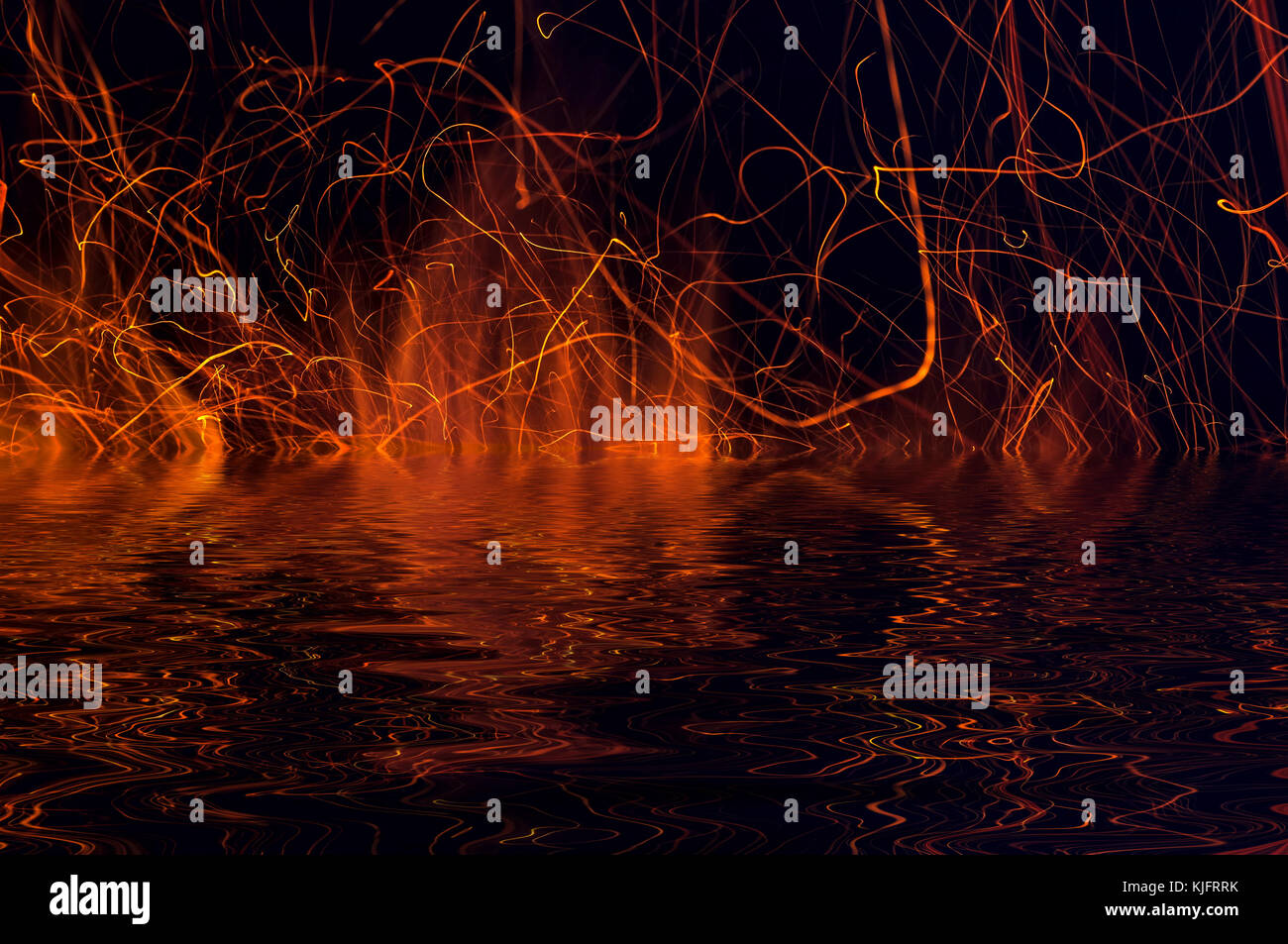 Flames of fire and sparks on a black background with reflection in ...