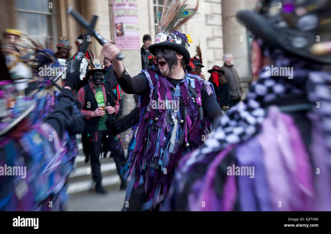 Morris dancers with blackened faces perform during the Stroud Wassail ...